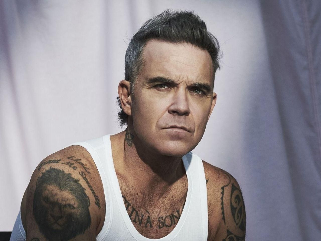 Robbie Williams wystrzeliwuje z nowym singlem! "Rocket" zapowiada album ...